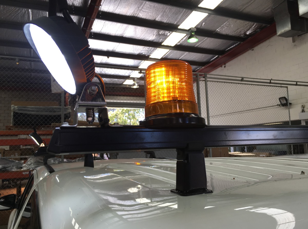 HiLux 2017 Revolution LED work lights with handle on Canopy Roof Racks ...